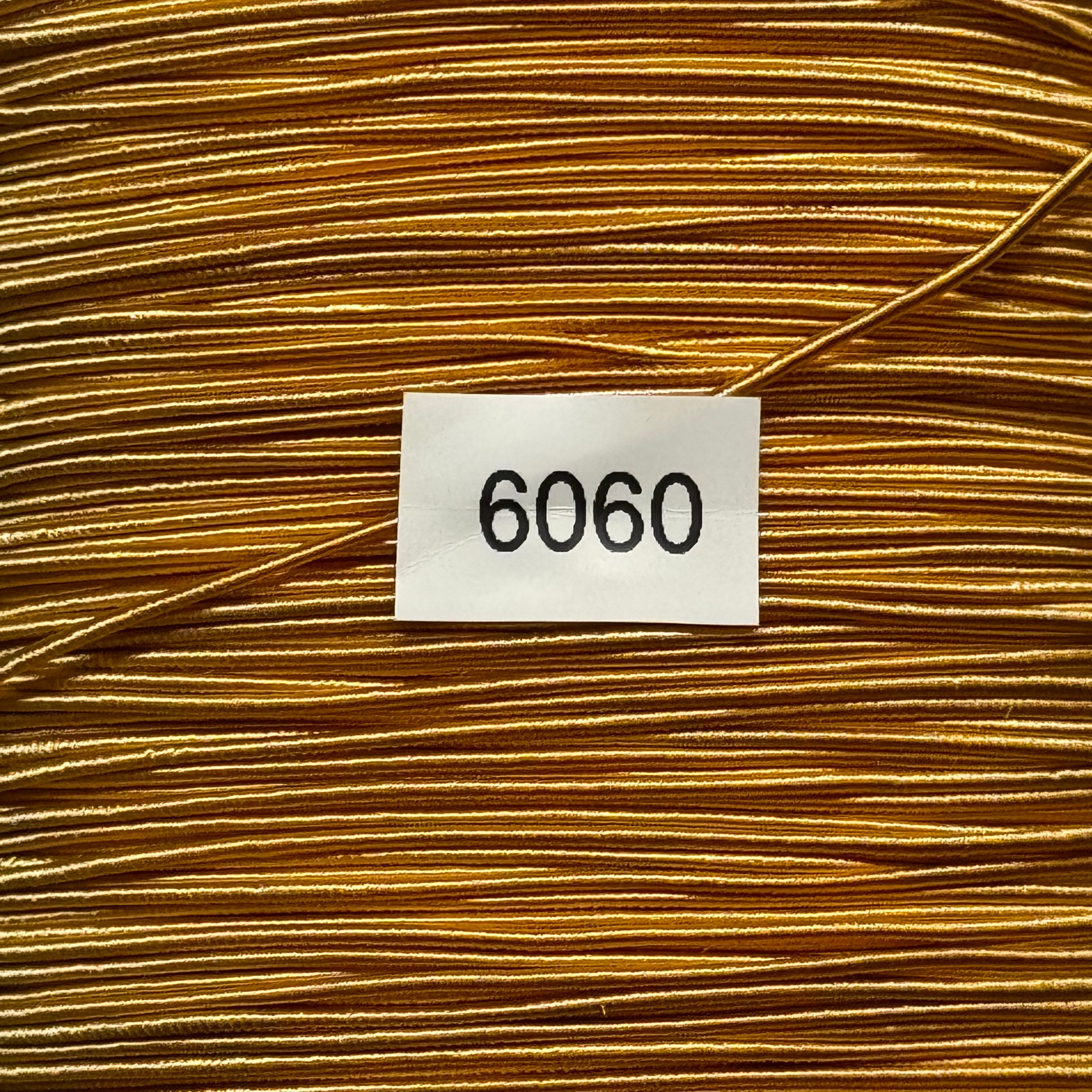 6060 Light Orange Memory Thread | DMC – The Needlepoint Clubhouse